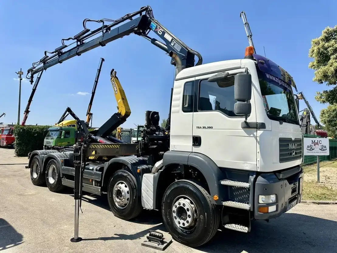 À vendre: MAN TGA 35.390 8x4 HOOKLIFT + CRANE HIAB 166-4 - RADIO / 5+6 ...